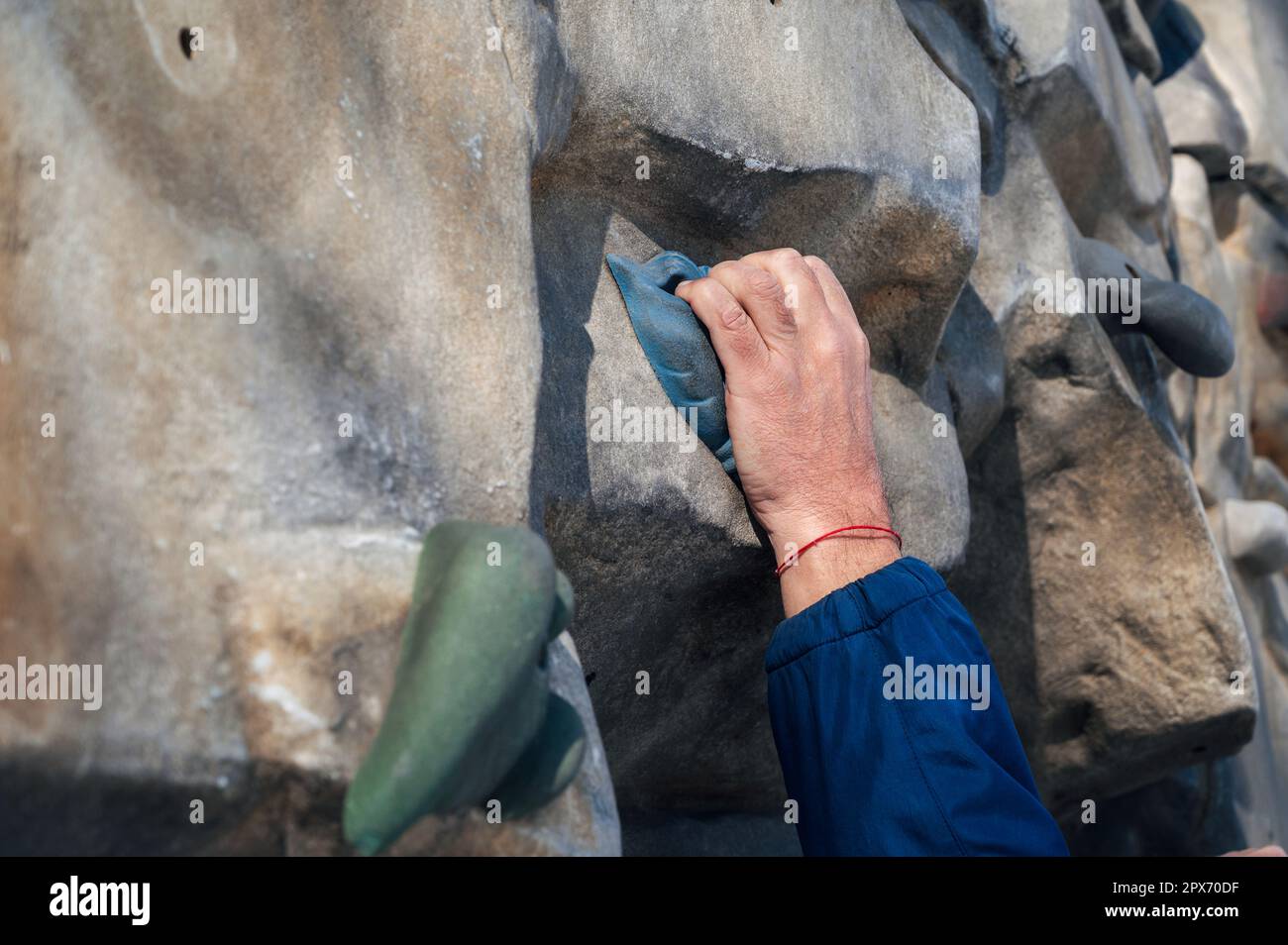 hands of a male climber training on a climbing wall Stock Photo - Alamy