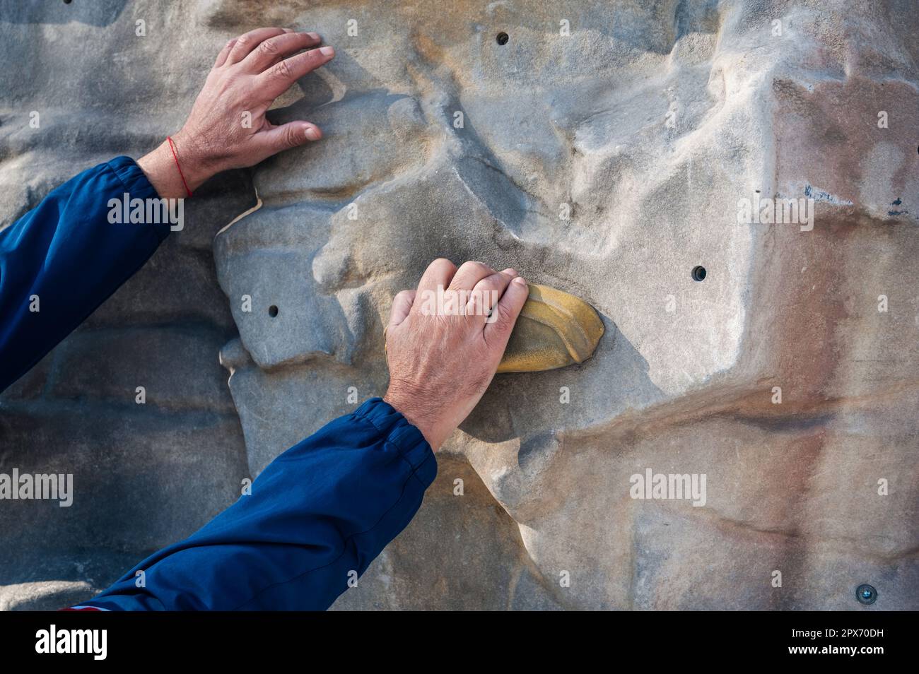 Climber hands holding artificial hi-res stock photography and images ...
