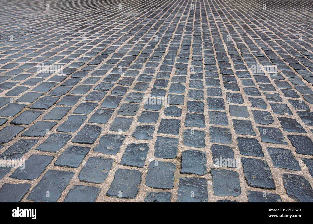 Surface is paved with road tiles of different sizes as texture Stock ...