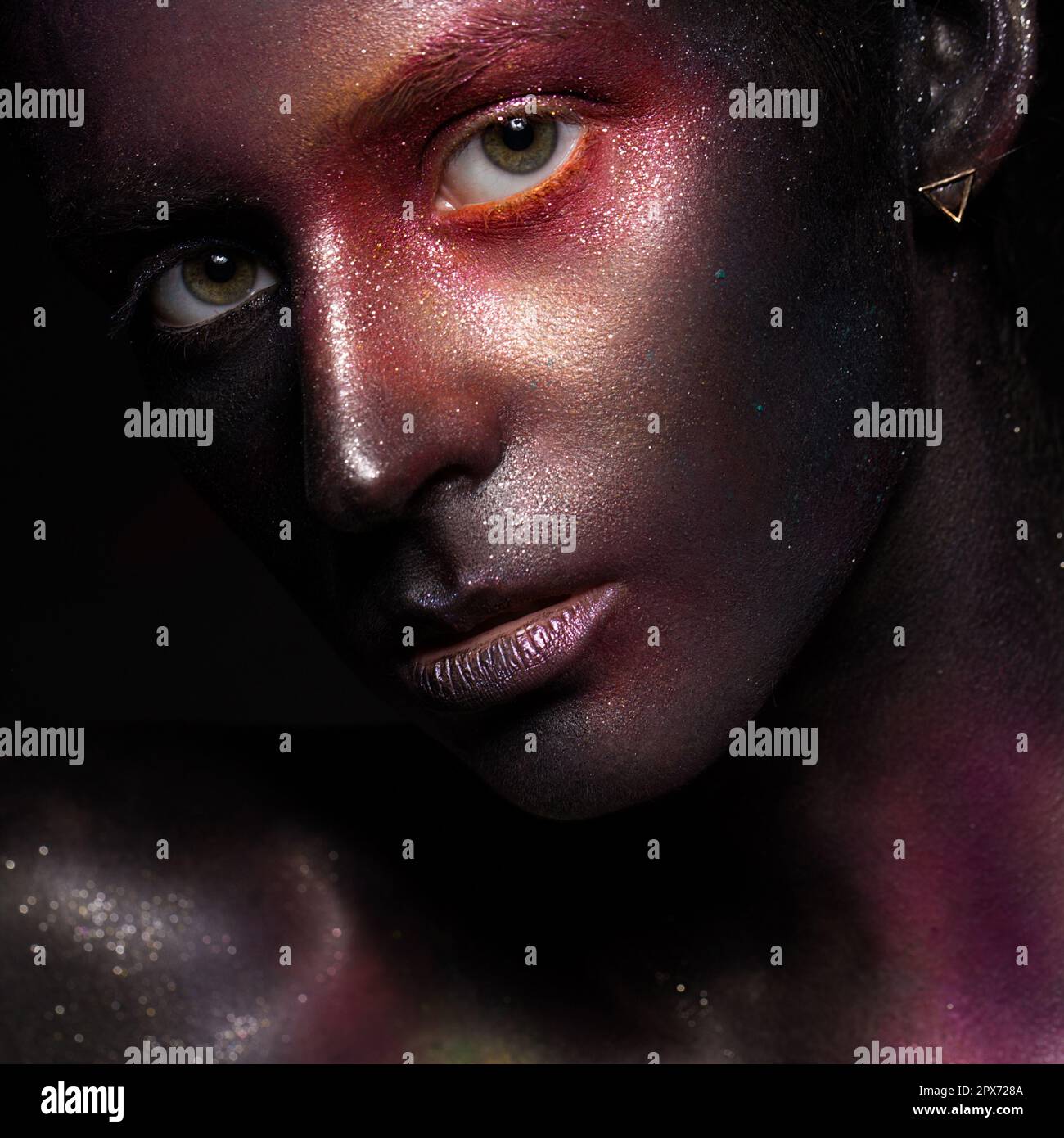 Beautiful girl with art space makeup on her face and body. Glitter Face ...