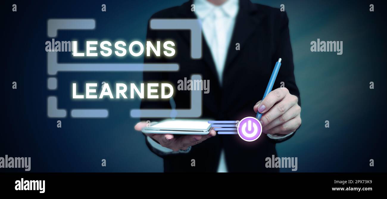 Hand writing sign Lessons Learned, Business concept Promote share and use knowledge derived from ...