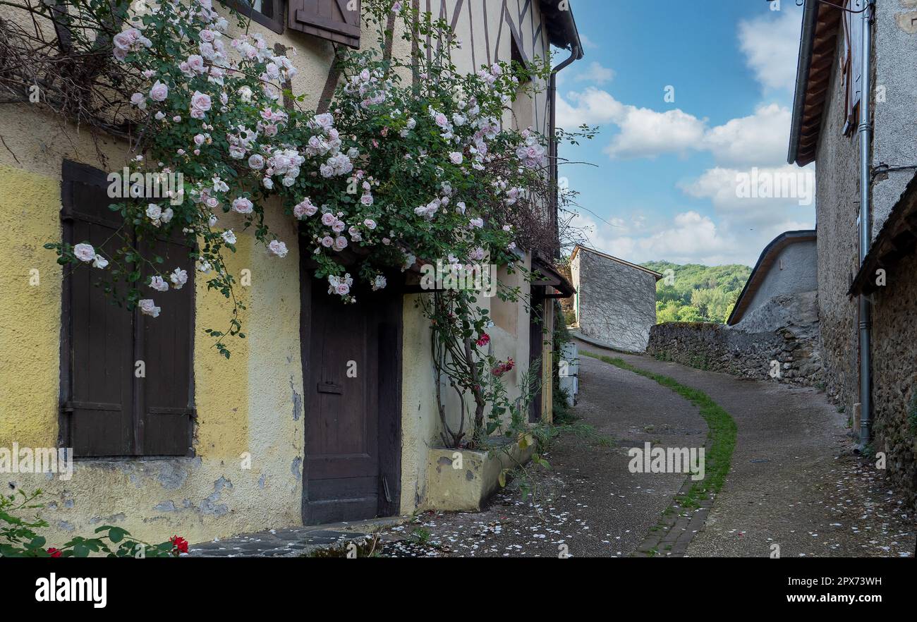 typical street of a french village with flowers Stock Photo - Alamy