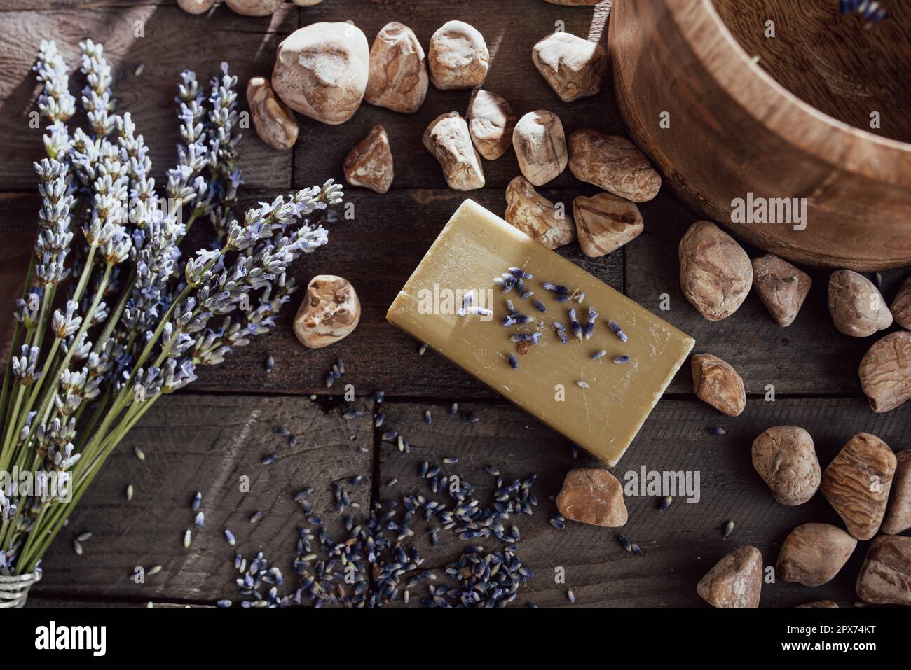Healthy lavender aromas for wellness and beauty on rustic wood. Close ...