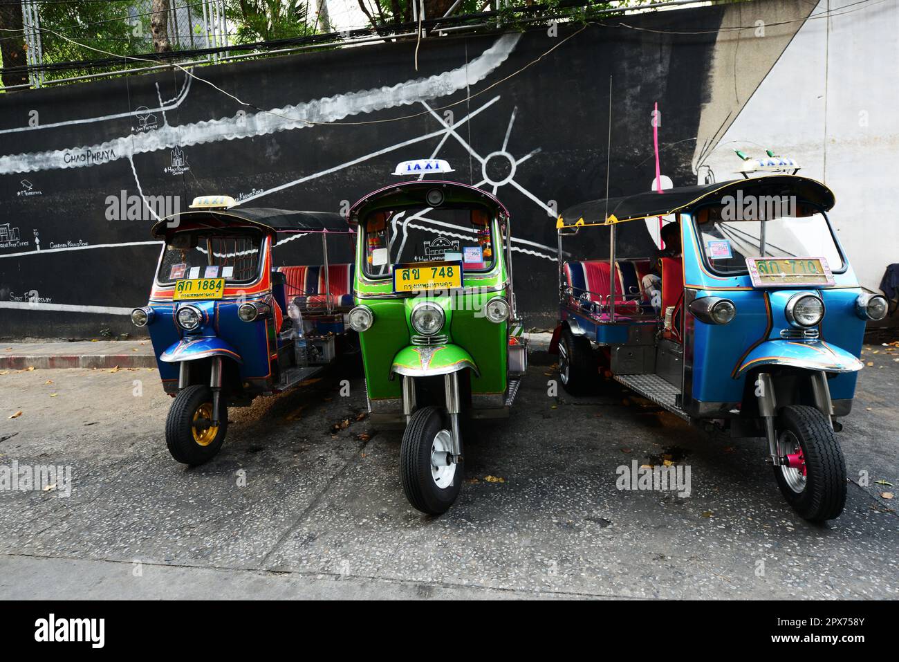 Colorful Tuktuks ( Traditional Thai motored Three Wheeler taxi ) in Bangkok, Thailand Stock ...