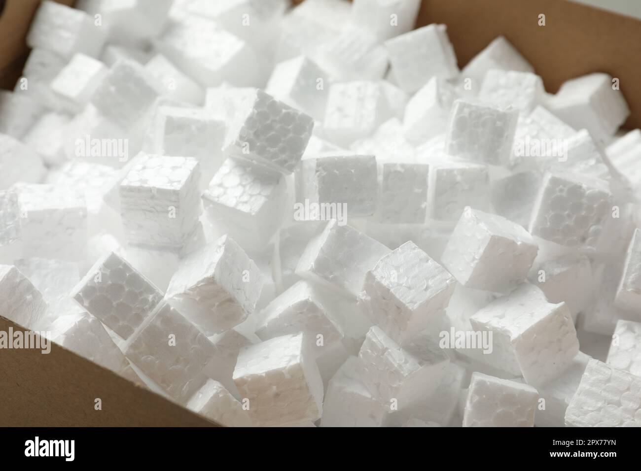 Closeup view of cardboard box with styrofoam cubes Stock Photo - Alamy