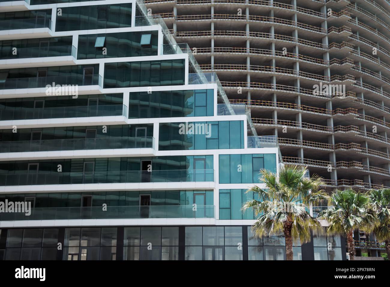 Modern and unfinished buildings outdoors. Construction site Stock Photo ...