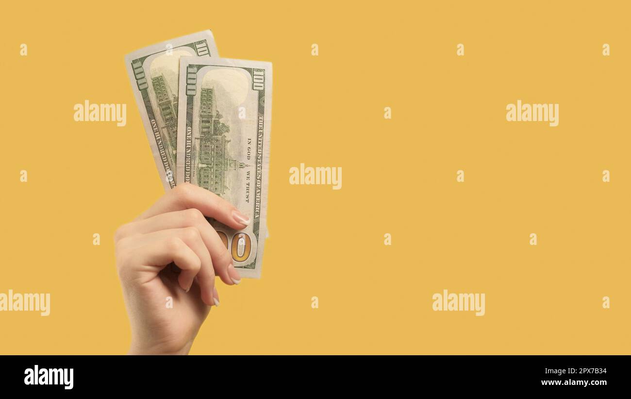 Money gesture profitable investment hand dollar Stock Photo - Alamy