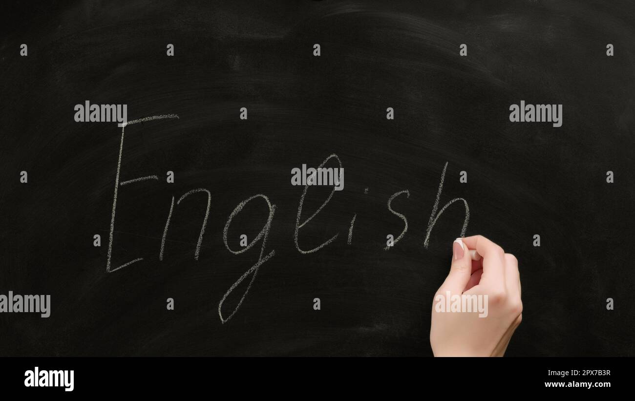 English school foreign language study female hand Stock Photo - Alamy