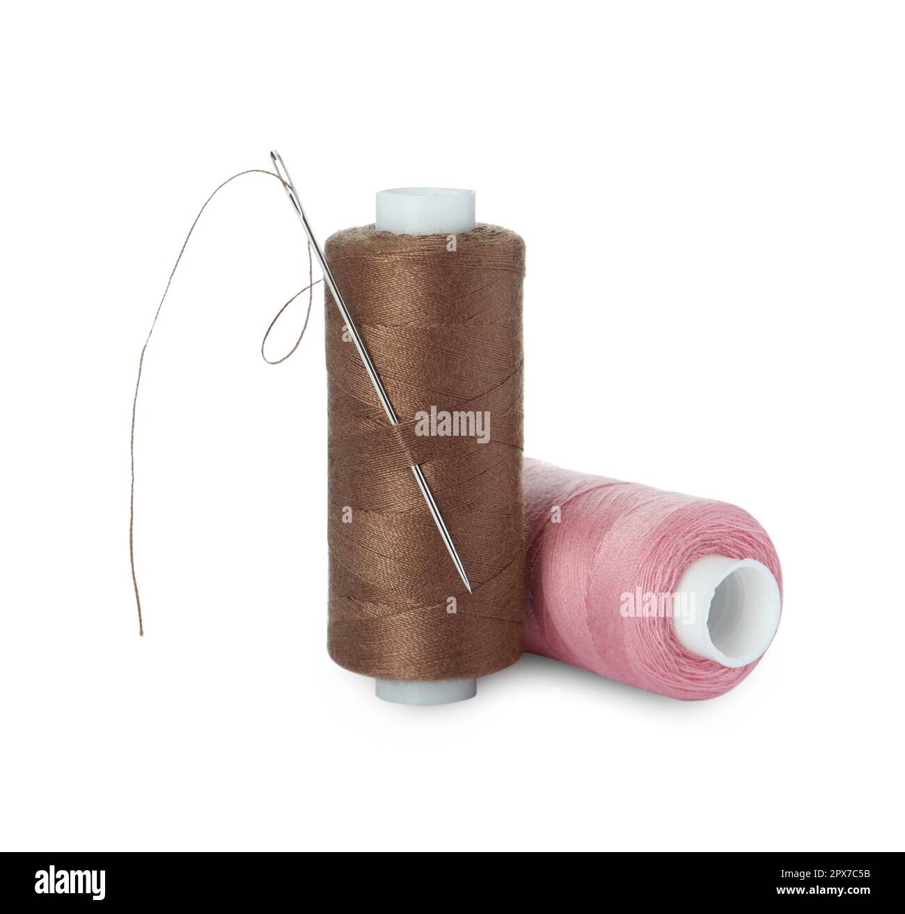 Different colorful sewing threads and needle on white background Stock ...