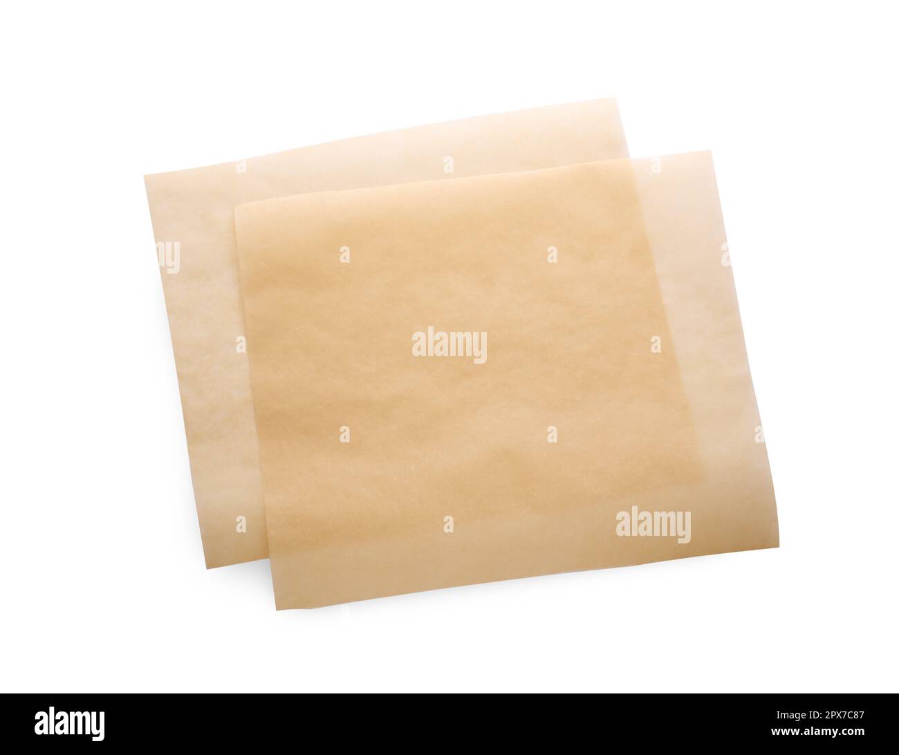 Sheets of baking paper isolated on white Stock Photo - Alamy