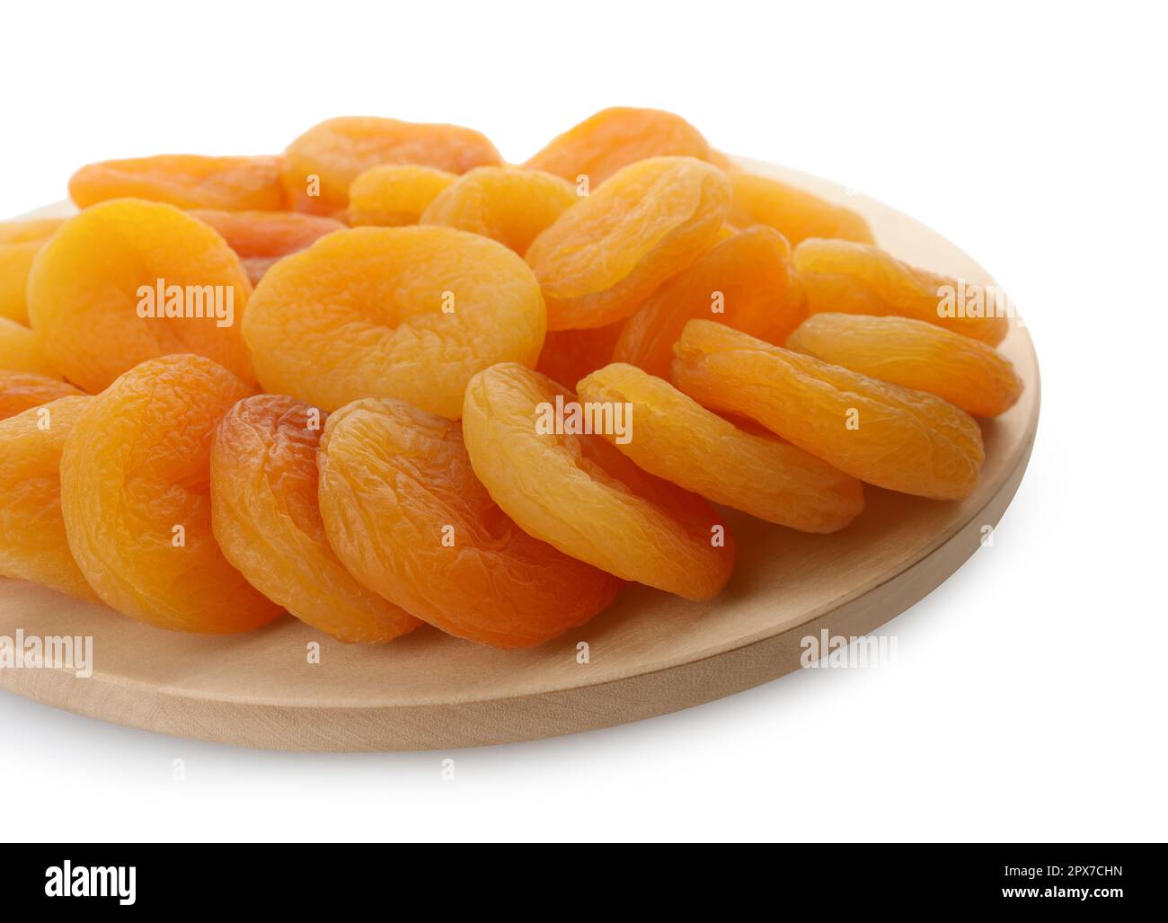Wooden tray with tasty dried apricots isolated on white Stock Photo - Alamy