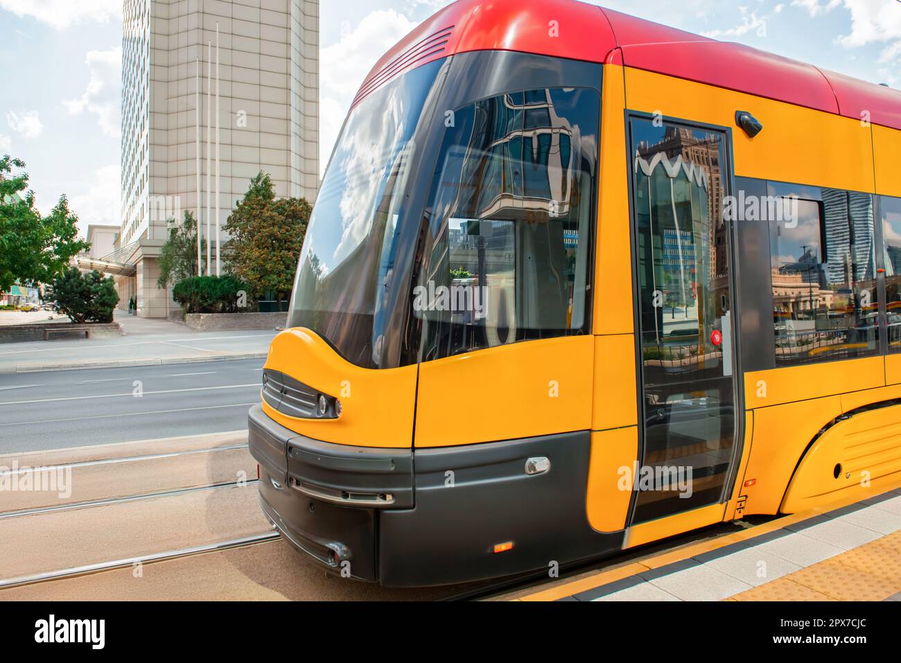 Streetcar on road in city. Public transport Stock Photo - Alamy