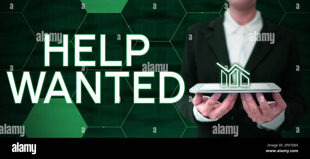 Sign displaying Help Wanted, Word Written on advertisement placed in ...