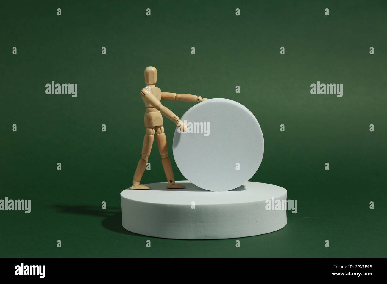 Product photography props. Round shaped podiums and wooden mannequin on ...