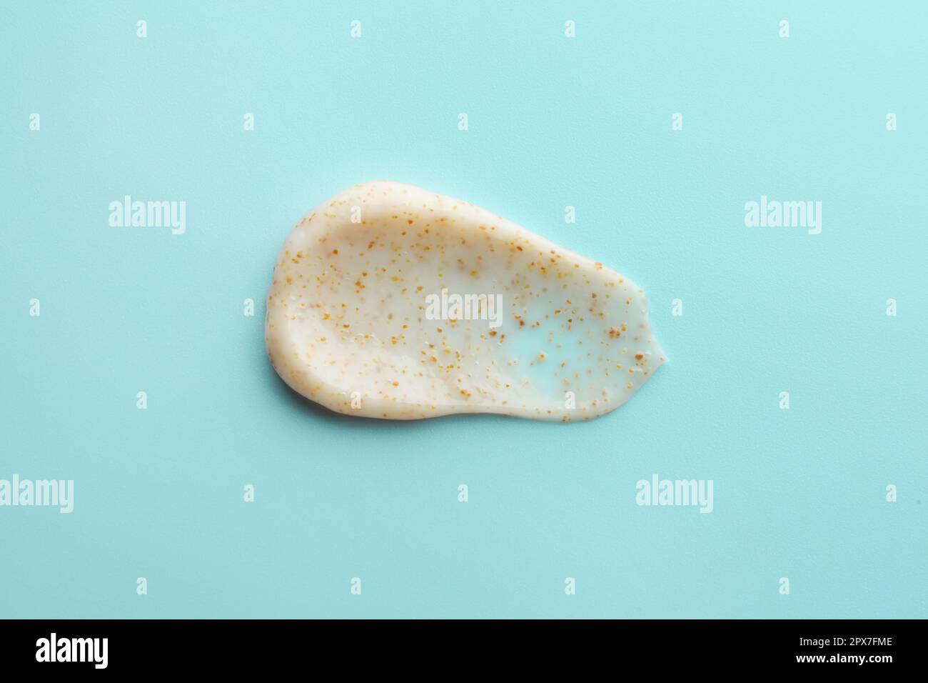 Sample of face scrub on light blue background, top view Stock Photo - Alamy
