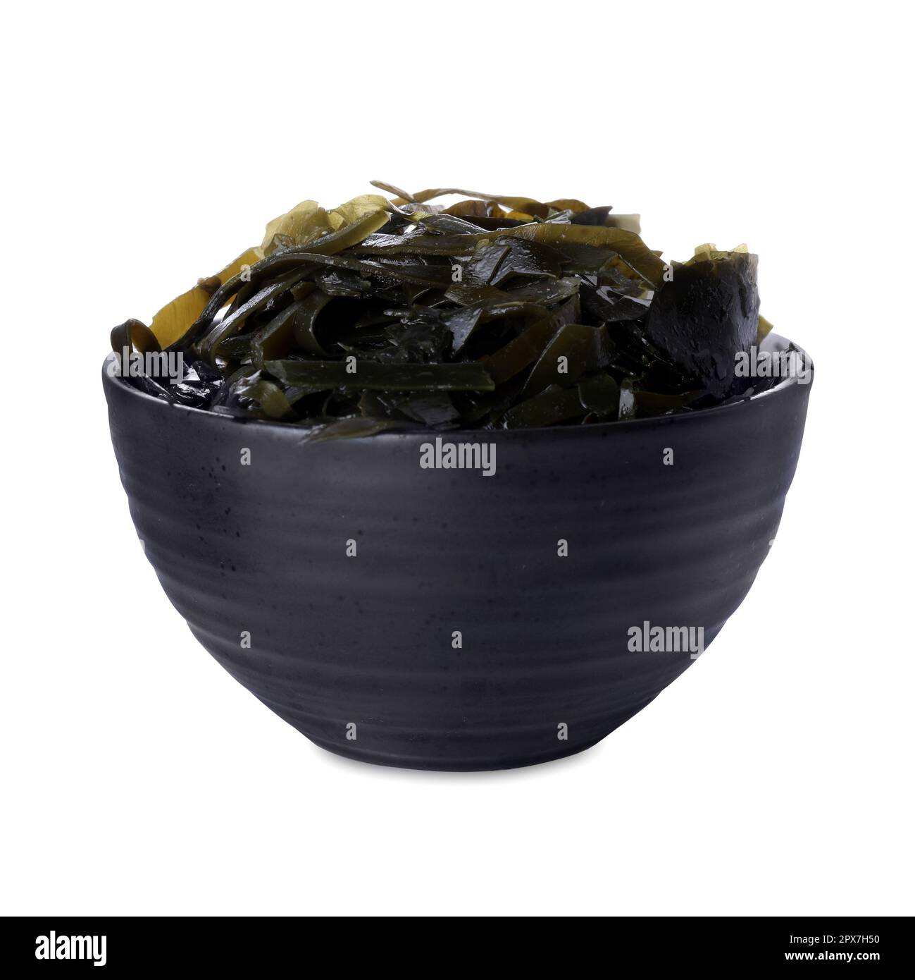 Fresh laminaria (kelp) seaweed in bowl isolated on white Stock Photo ...