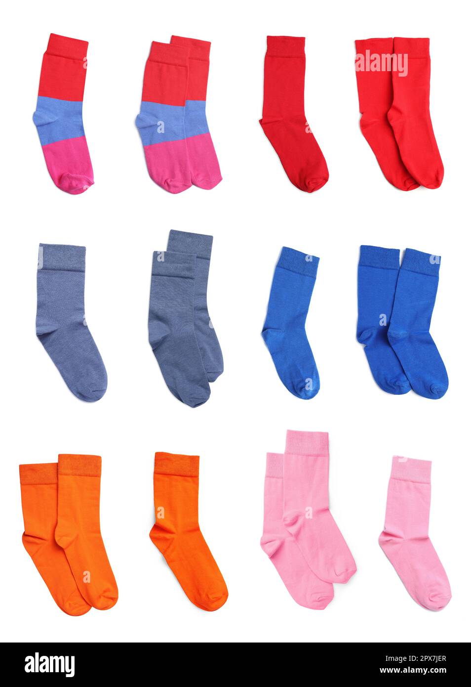 Set with pairs of different color socks on white background, top view ...