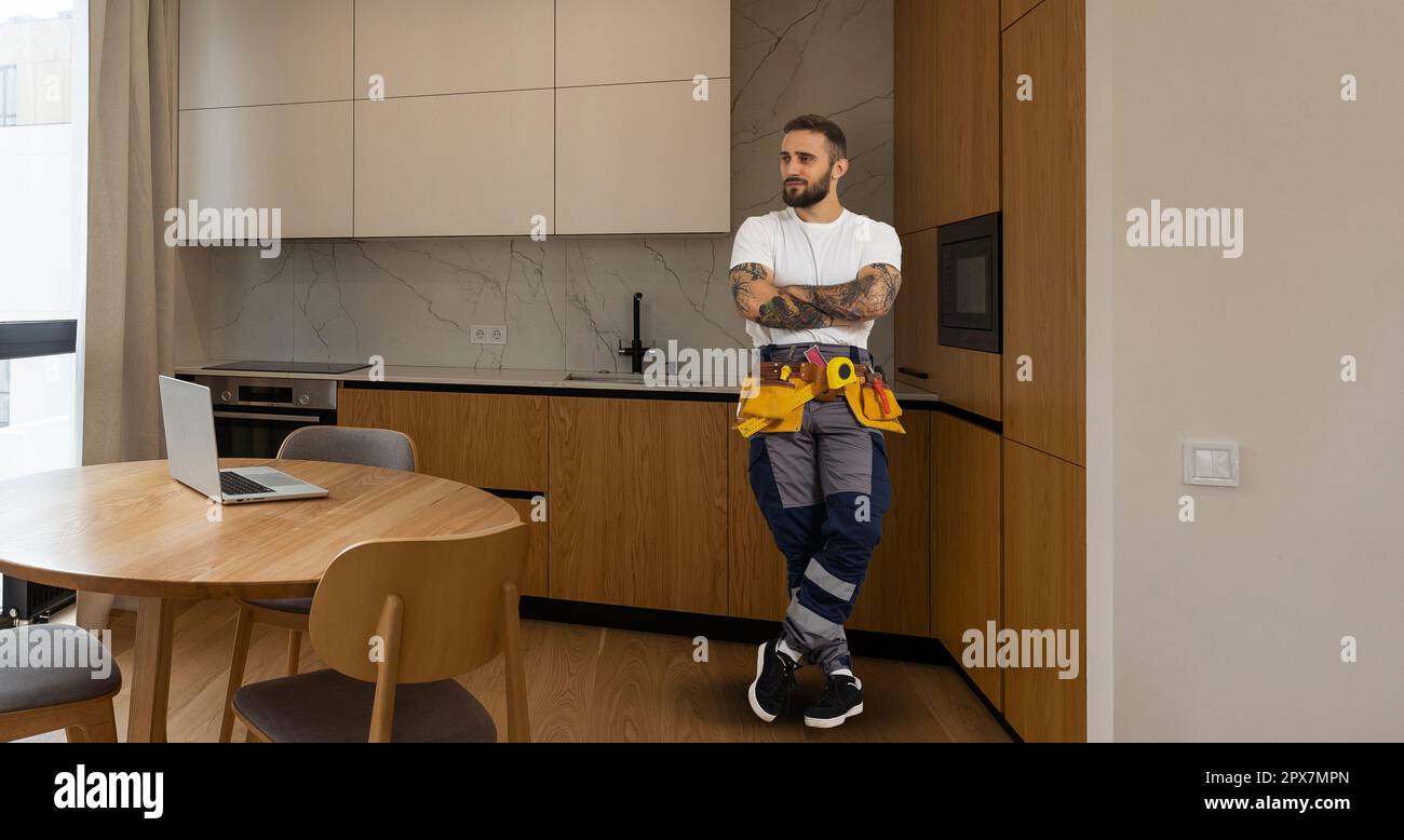 working man is working on repairs Stock Photo - Alamy