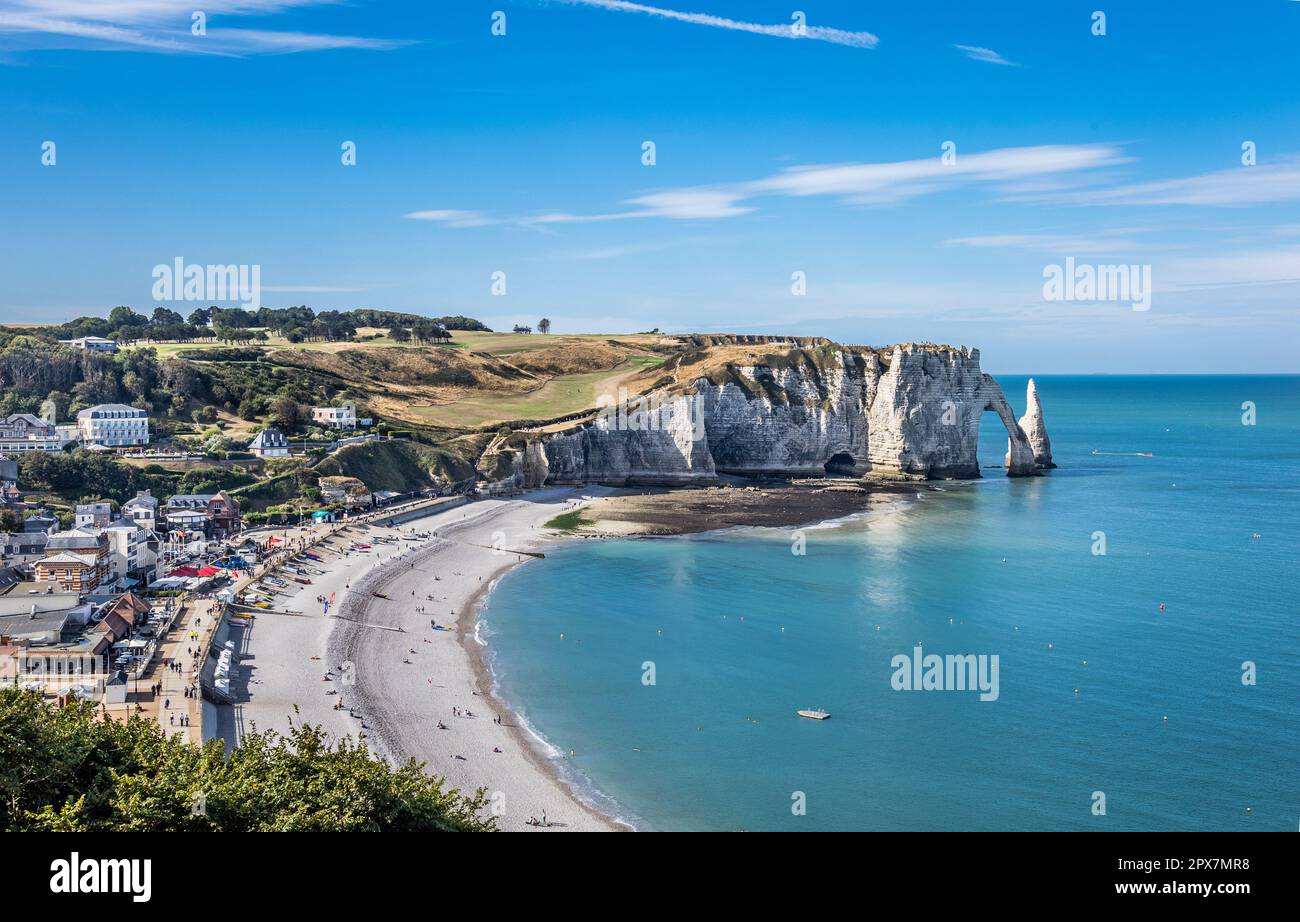 beach of Étretat with view of the 70m-high chalk cliff of Falaise d ...