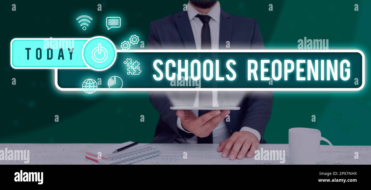 Hand writing sign Schools Reopening, Word Written on classes are over ...