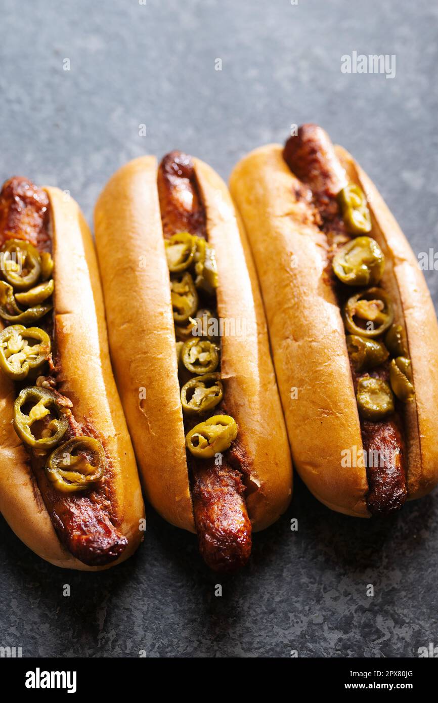 rustic american street food spicy chili hotdog Stock Photo - Alamy