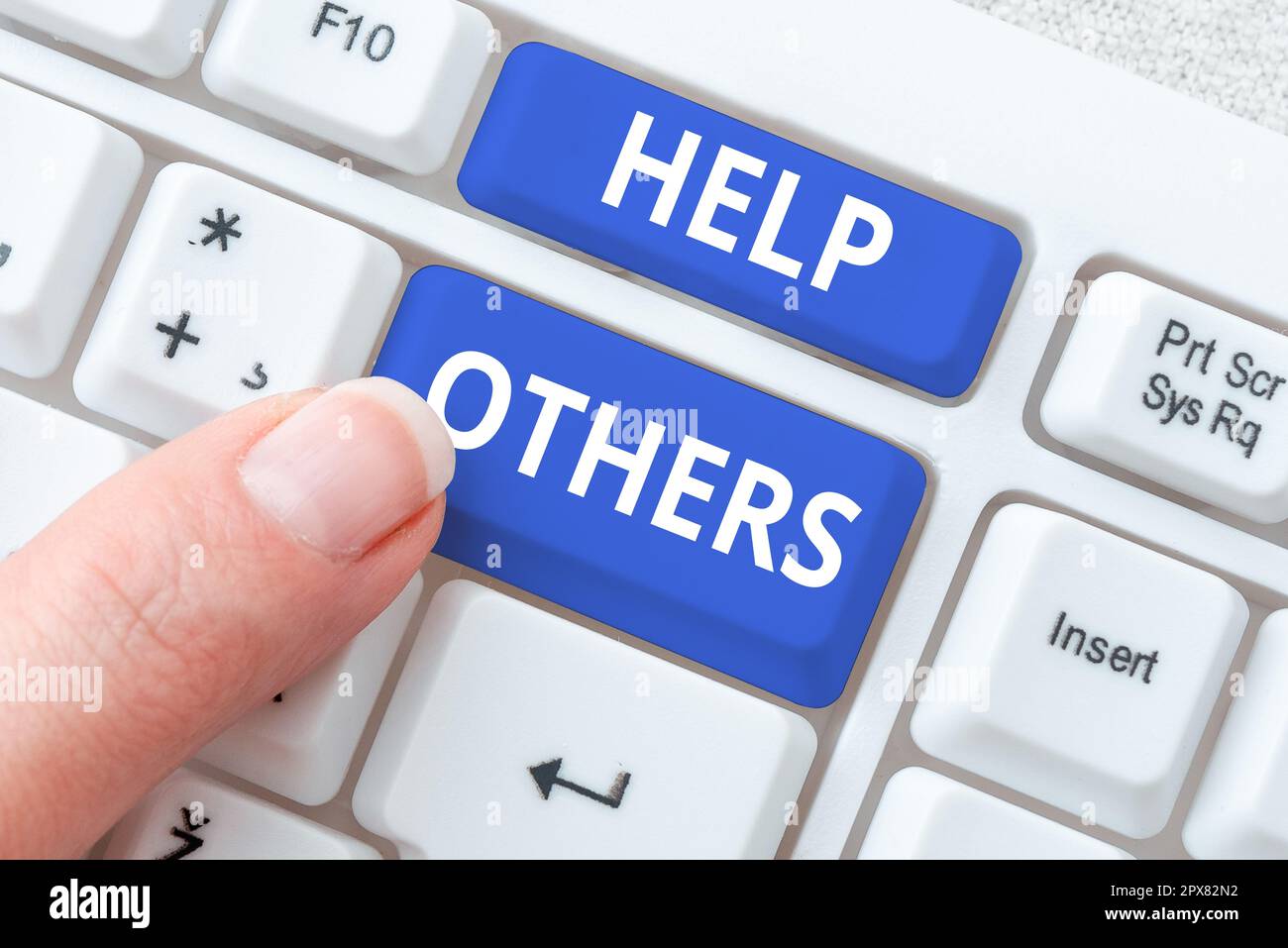 Helping someone climb hi-res stock photography and images - Alamy