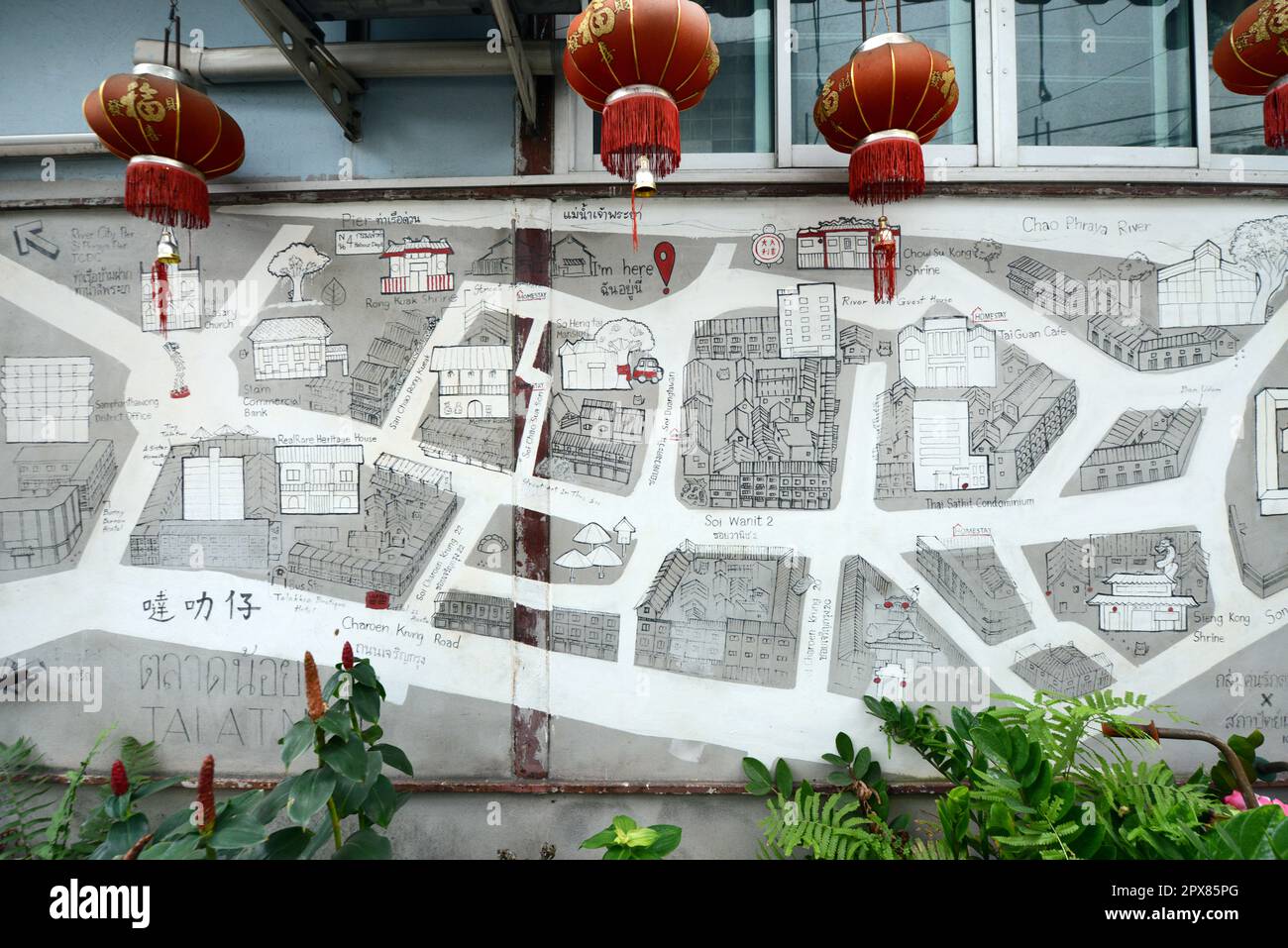 A wall mural map of the historical neighborhood of Talat Noi in Bangkok ...
