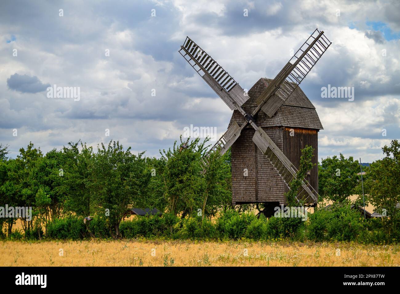 A view of a beautiful windmill in Thuringia Germany in a natural ...