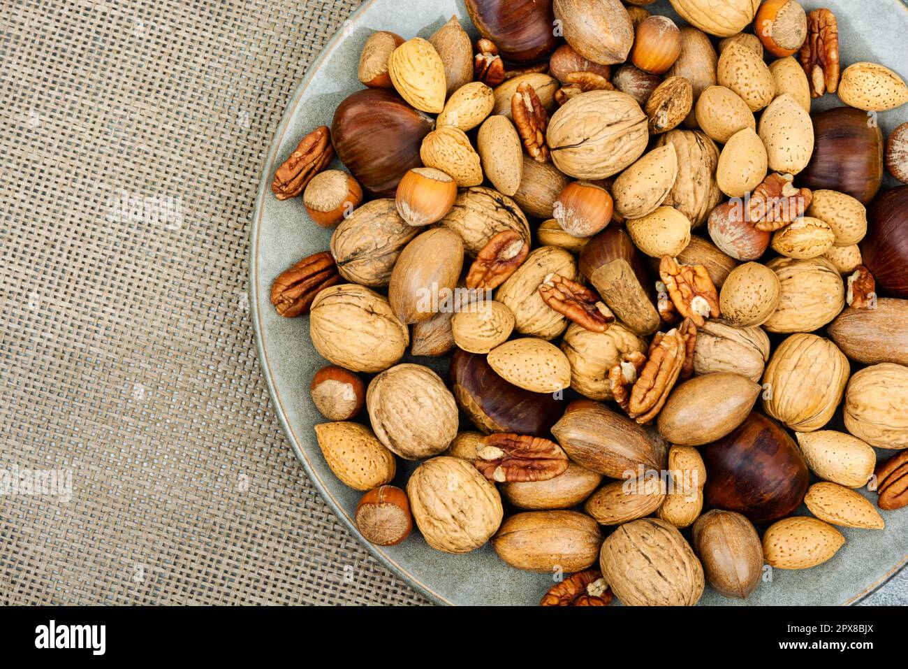 Walnut, chestnut, almond, hazelnut on the table Healthy snacks Stock ...