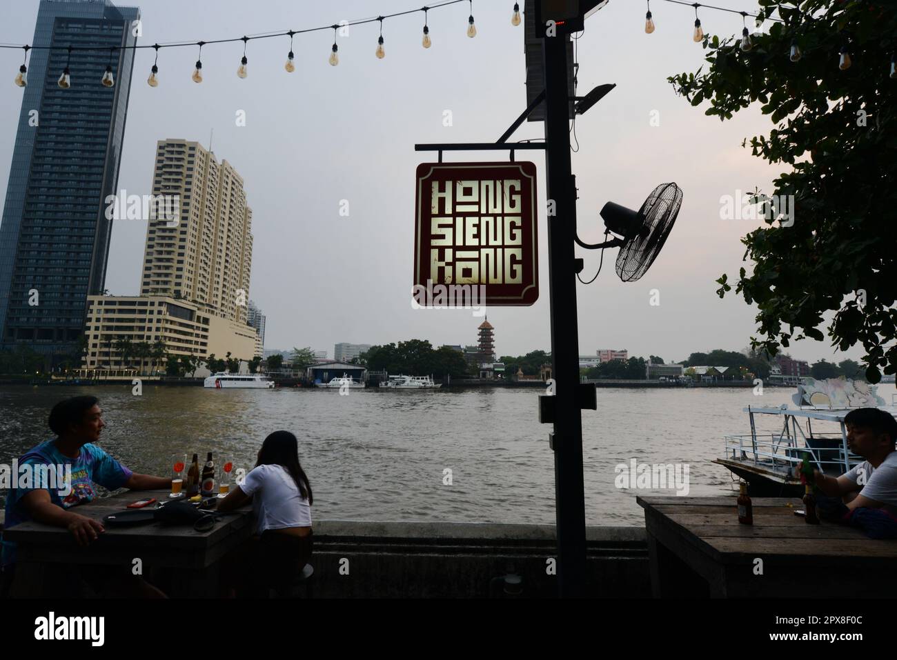 Chilling by the Chao Phraya river in the stylish Hong Sieng Kong bar ...