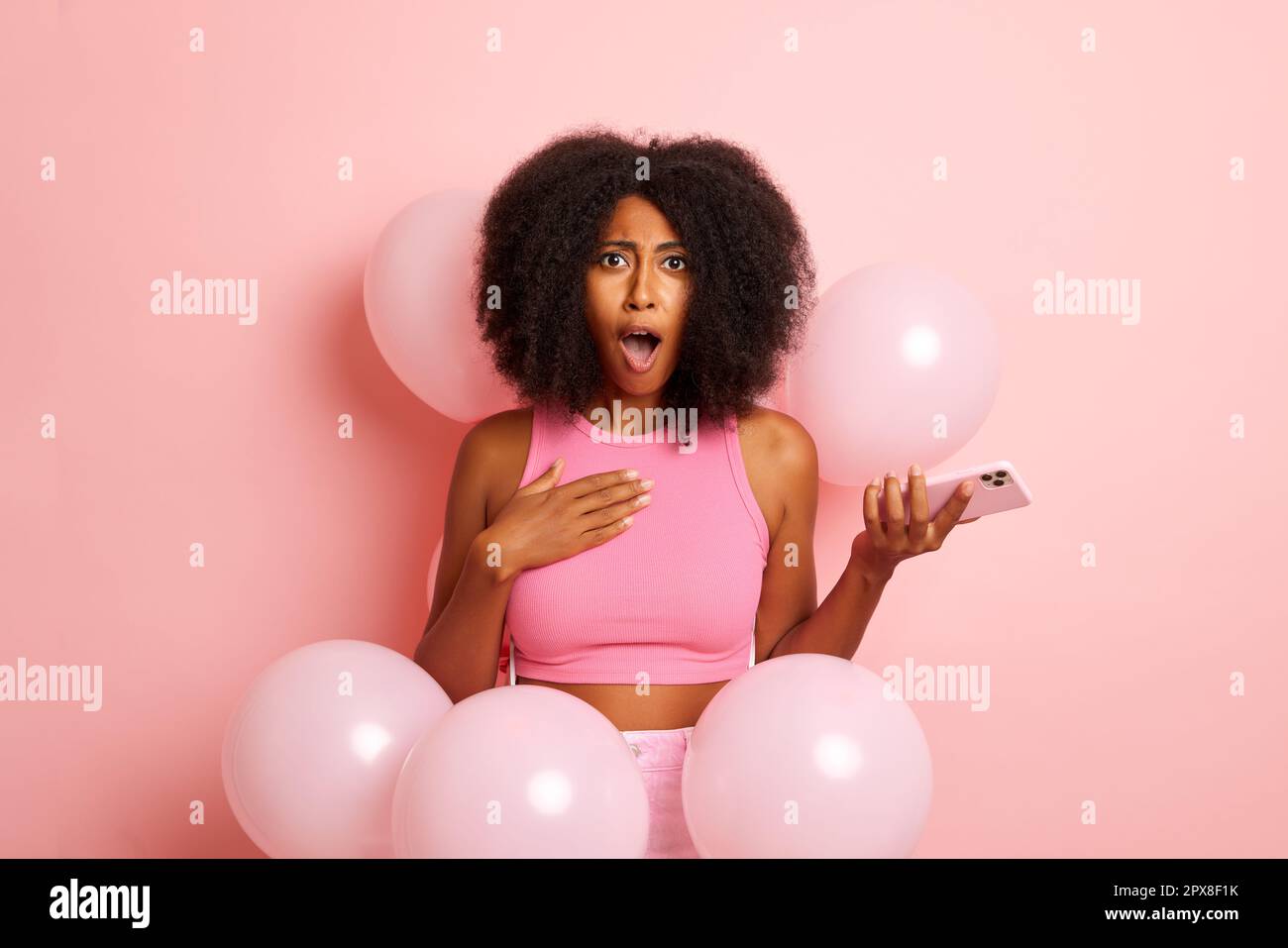 Positively surprised woman got the message on the smartphone, opened ...