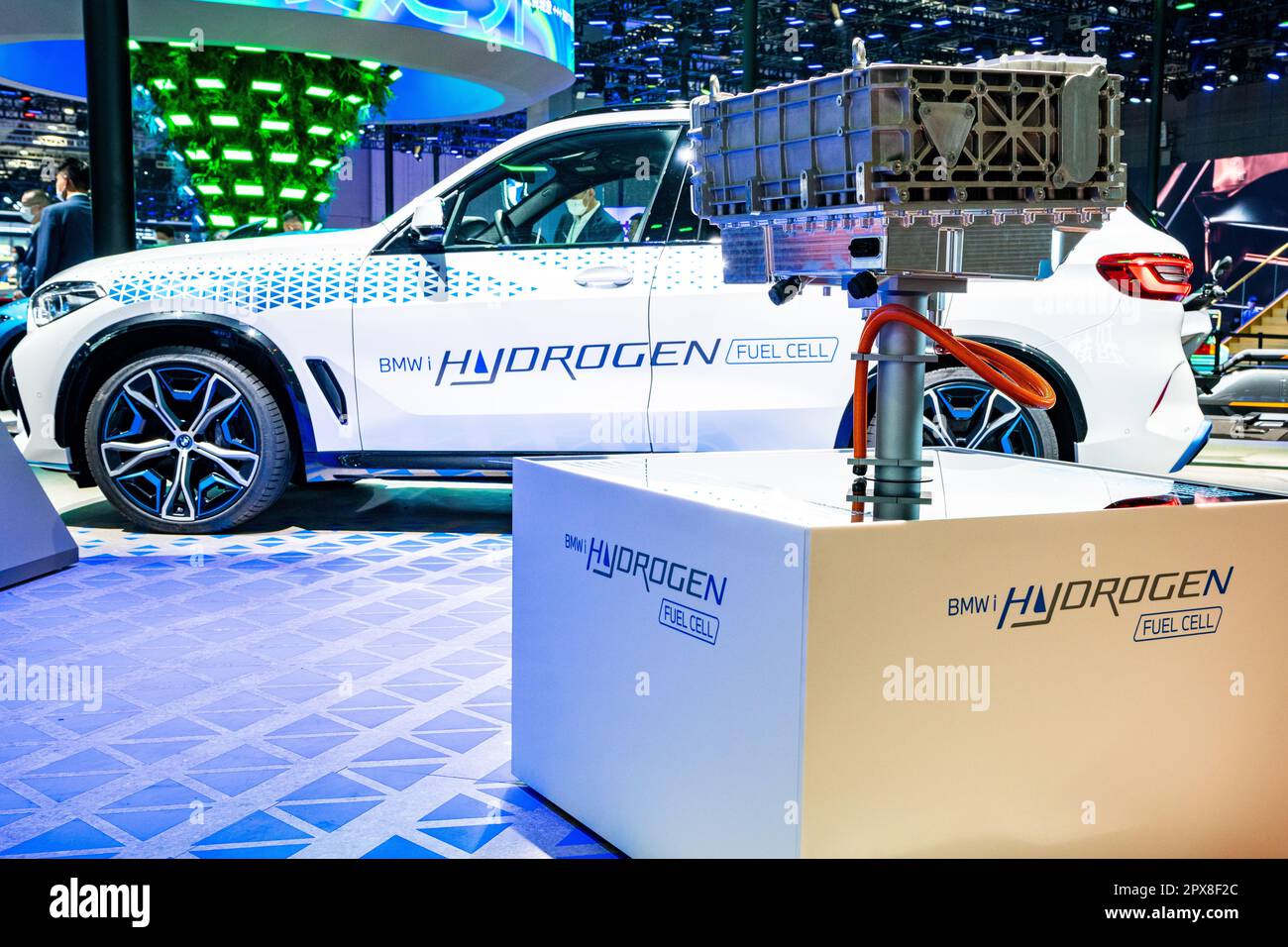 A BMW hydrogen fuel cell with a fuel cell powered iHydrogen X5 behind ...