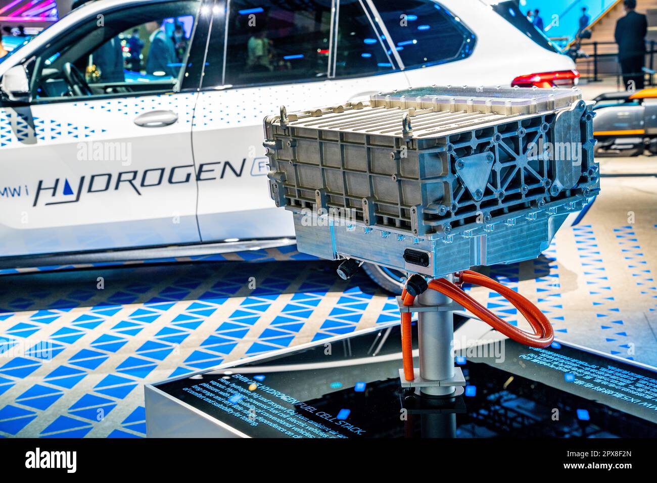 A Bmw Hydrogen Fuel Cell With A Fuel Cell Powered Ihydrogen X5 Behind On Display At The 2023