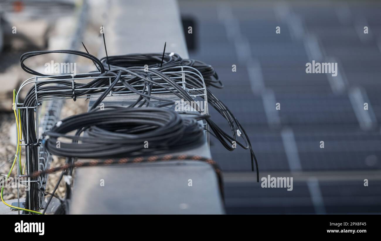 Solar panel power cables on a roof Stock Photo - Alamy