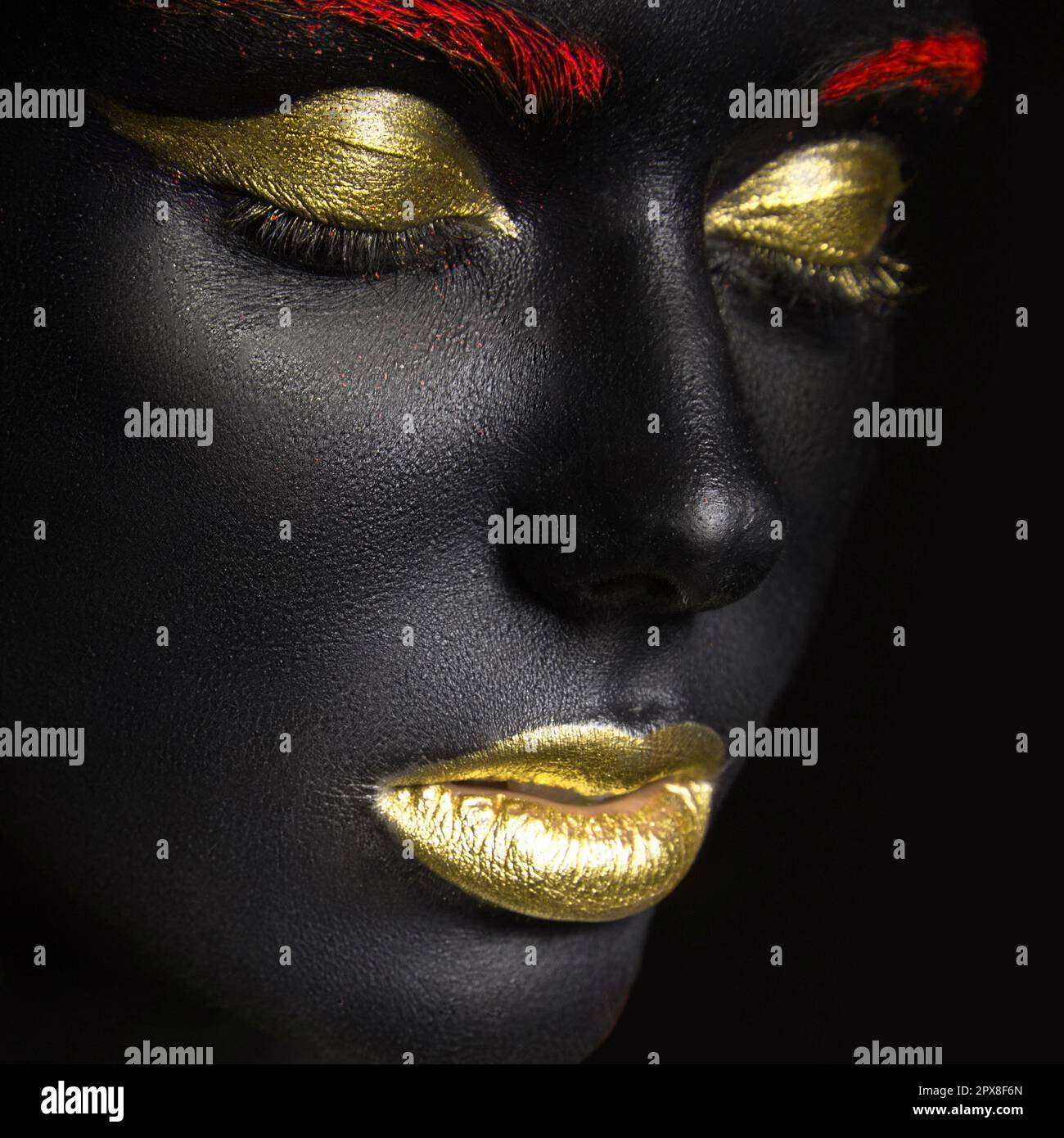 fashion portrait of a dark-skinned girl with color make-up.Beauty face ...