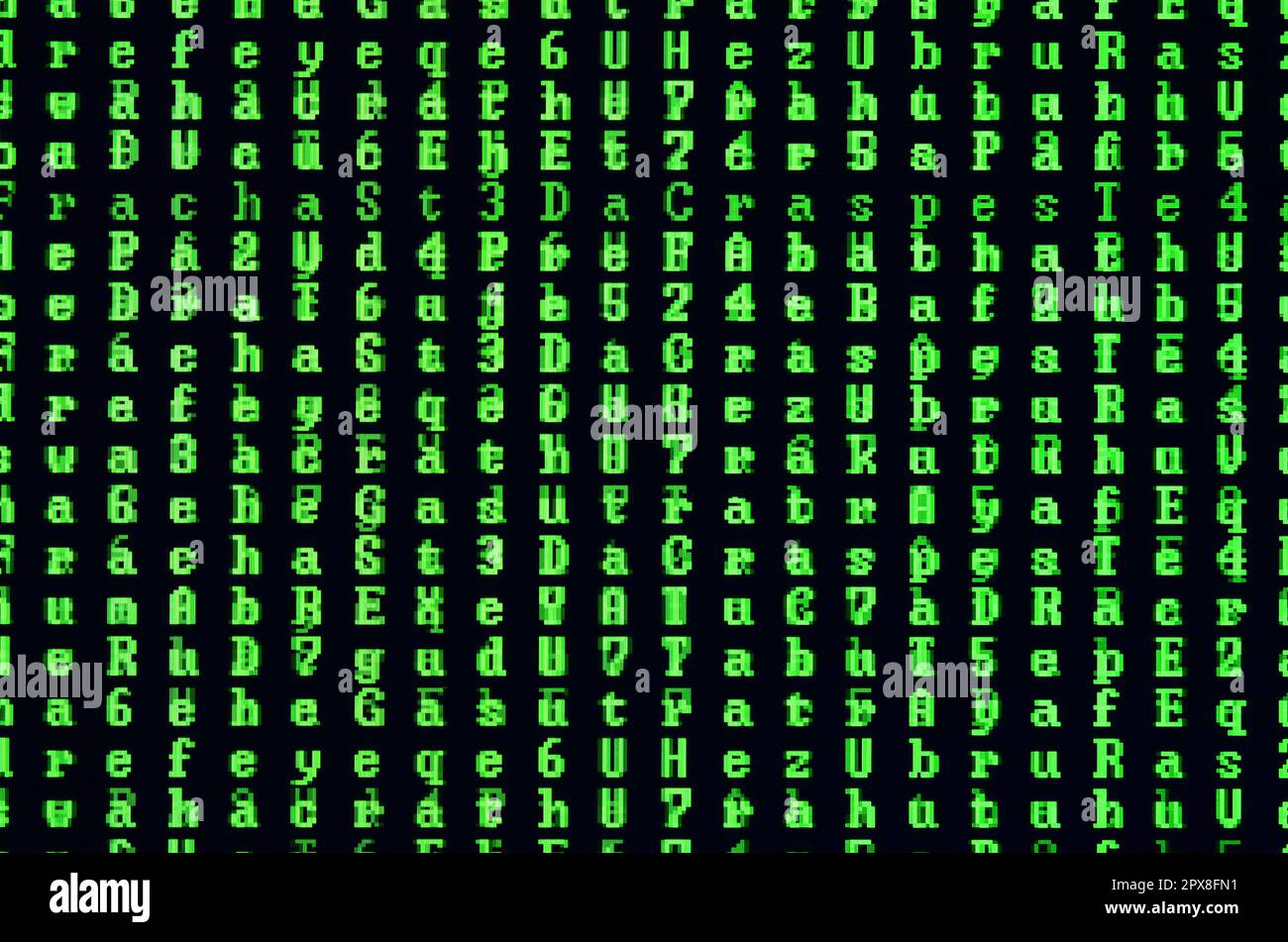 Macro shot of a glitch on the monitor of an office computer. The ...