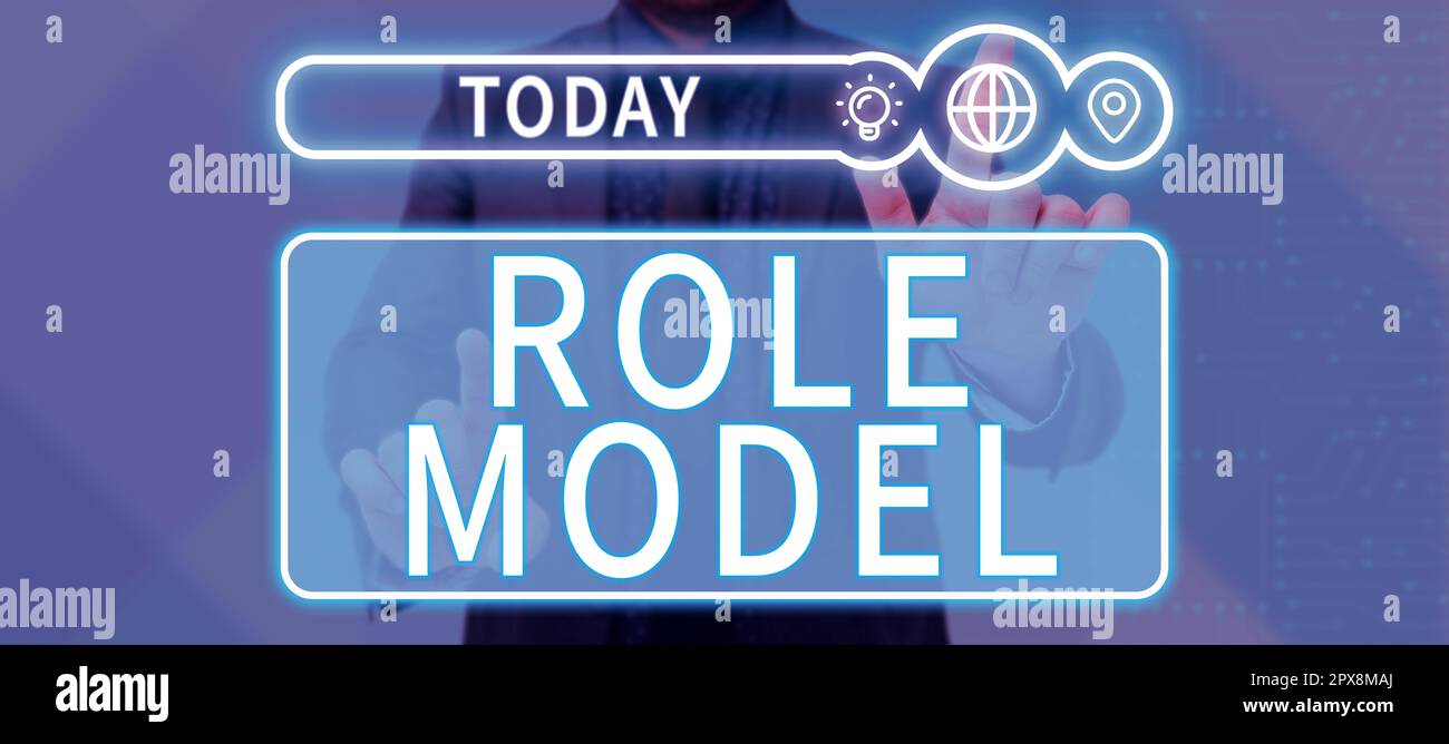 Sign displaying Role Model, Business approach a person looked to by ...