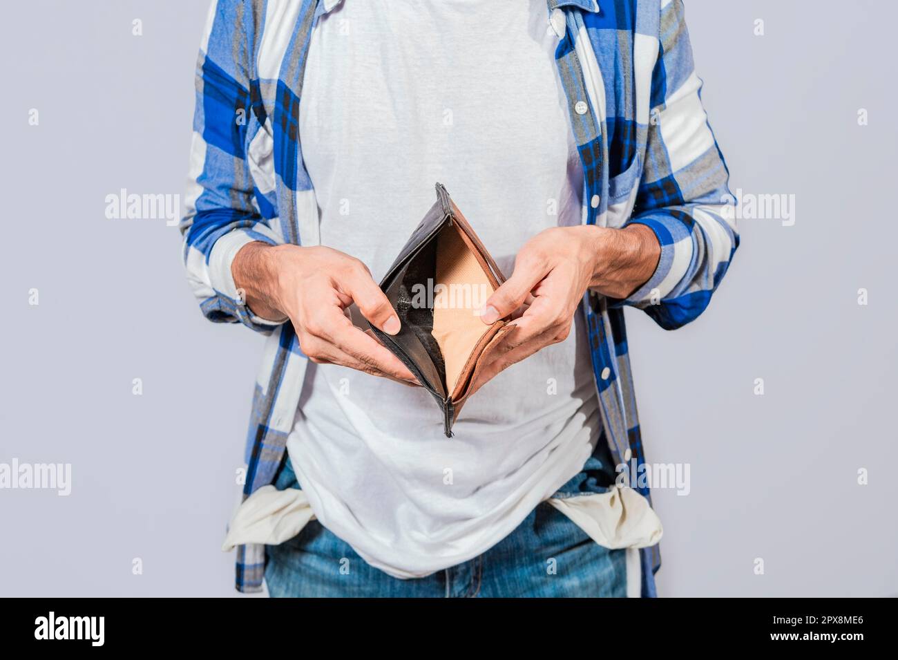 Concept of frustrated people without money. Hands showing an empty ...