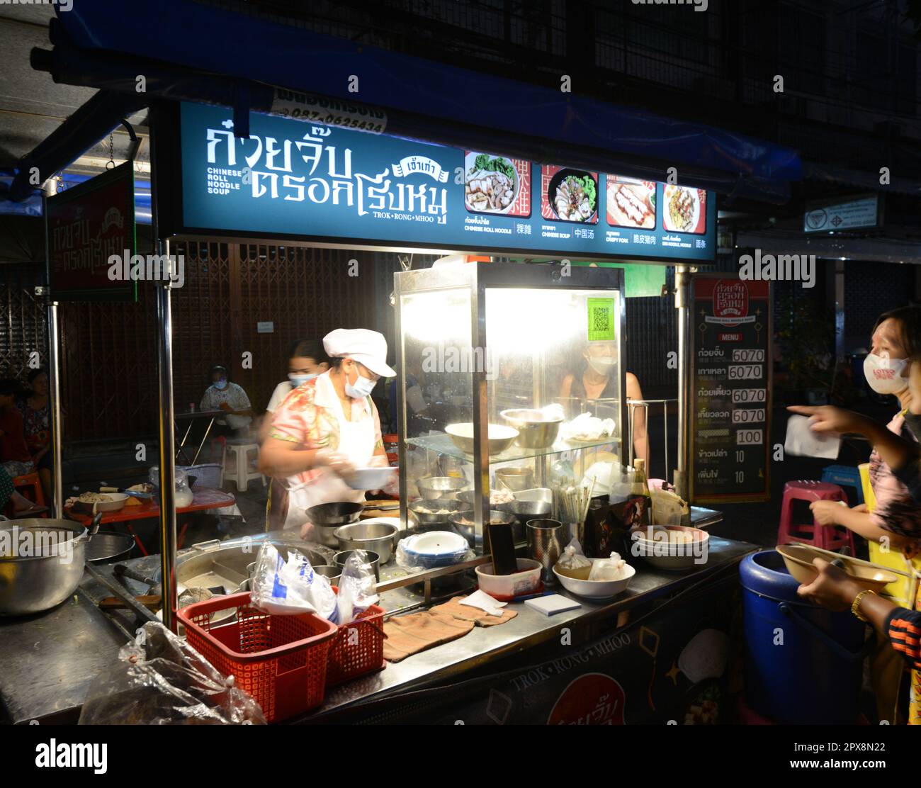 A Chinese noodle and wonton street food stall in Bangkok, Thailand ...