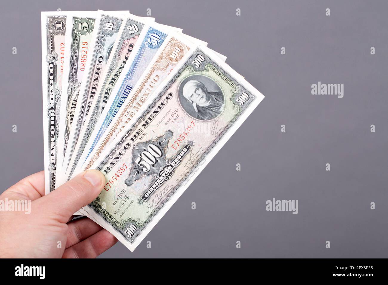 Old mexican pesos in hi-res stock photography and images - Alamy