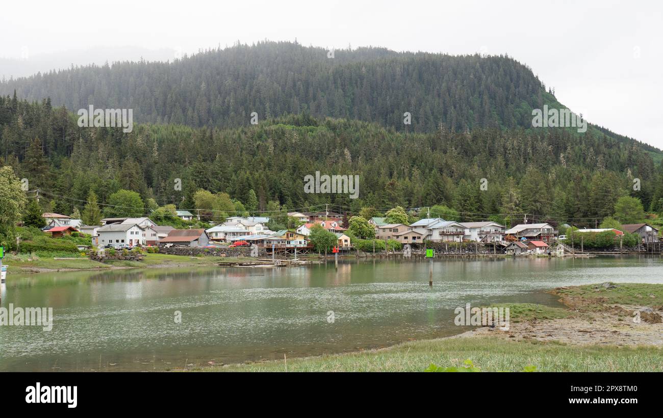 Mountain village on river. Mountain landscape. Houses of cottage ...