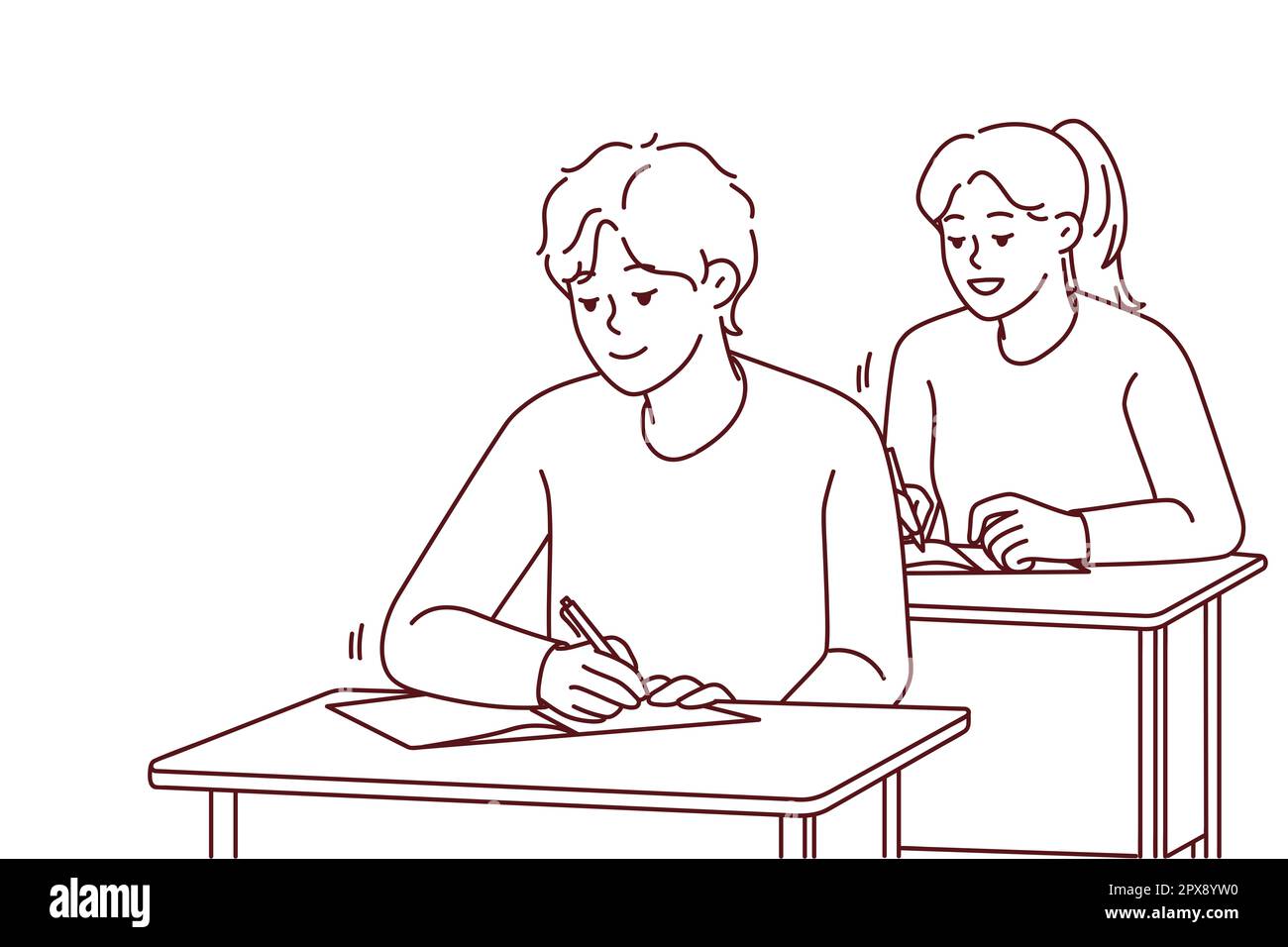 Smiling students sit at desk writing in notebooks on lesson in school ...