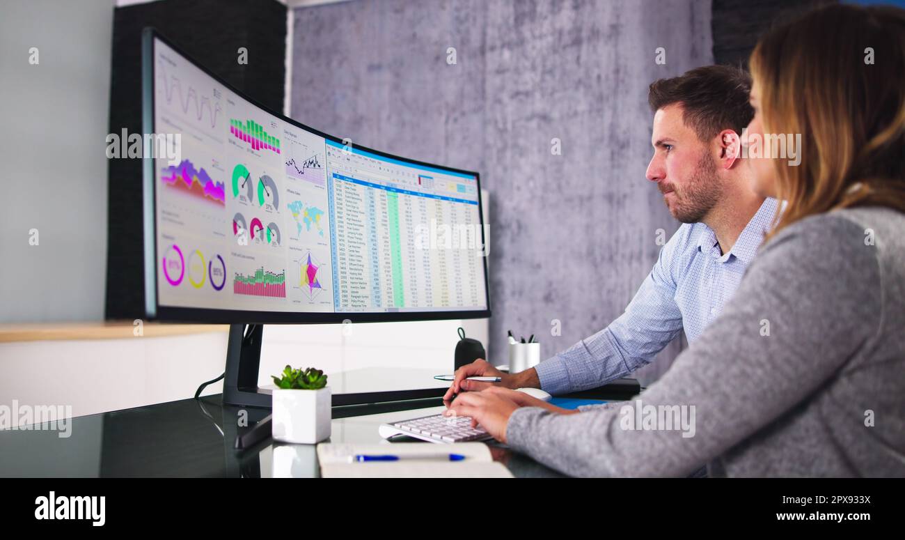 Analysts Looking At Business Data Analytics Dashboard Stock Photo - Alamy