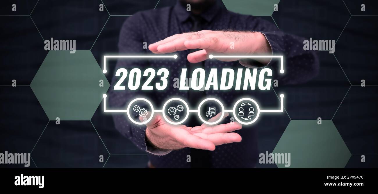 Sign displaying 2023 Loading, Business idea Advertising the upcoming ...
