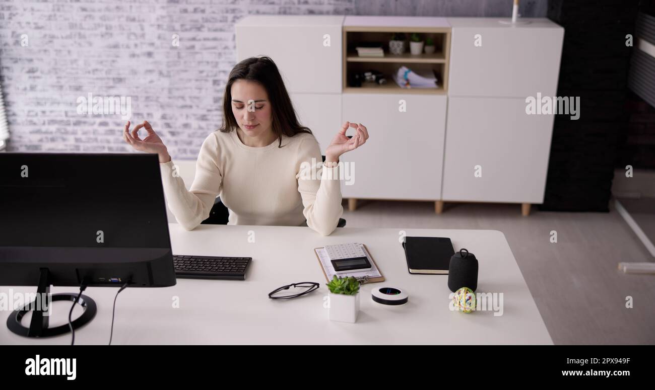 Healthy Yoga Meditation Exercise In Office Chair At Workplace Stock ...