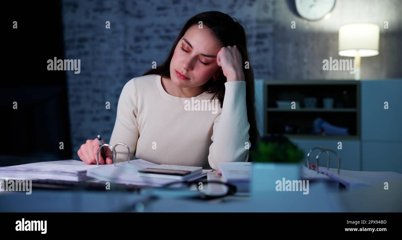 Stressed Tax Advisor With Headache. Sad Accountant Stock Photo - Alamy