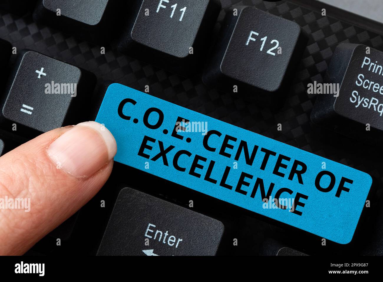Handwriting text C.O.E. Center Of Excellence, Concept meaning being ...