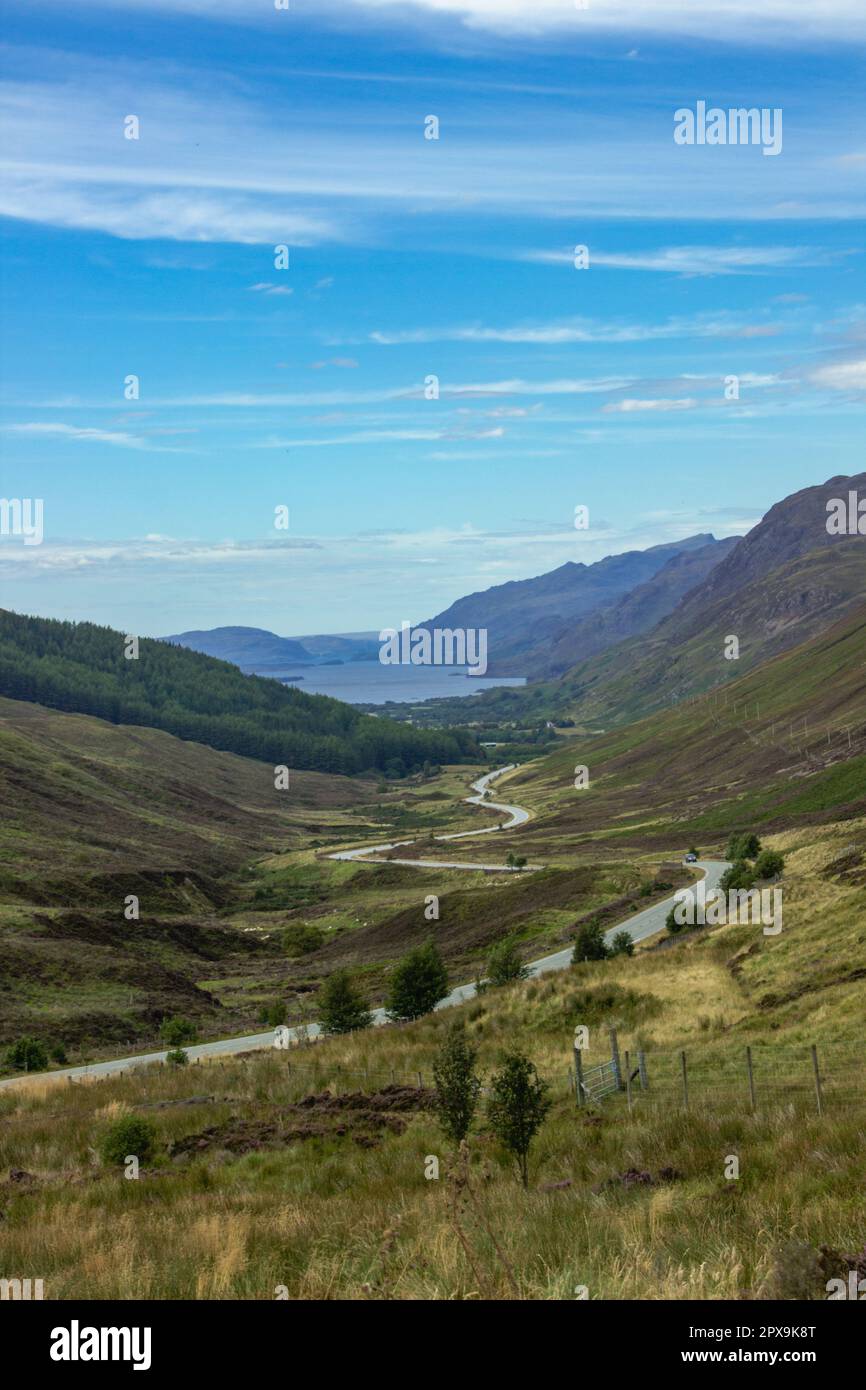 Loch Maree viewed from high up Glen Docherty with the road to ...