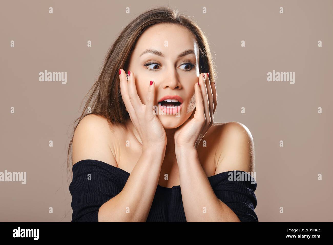 Surprised emotional young woman hi-res stock photography and images - Alamy