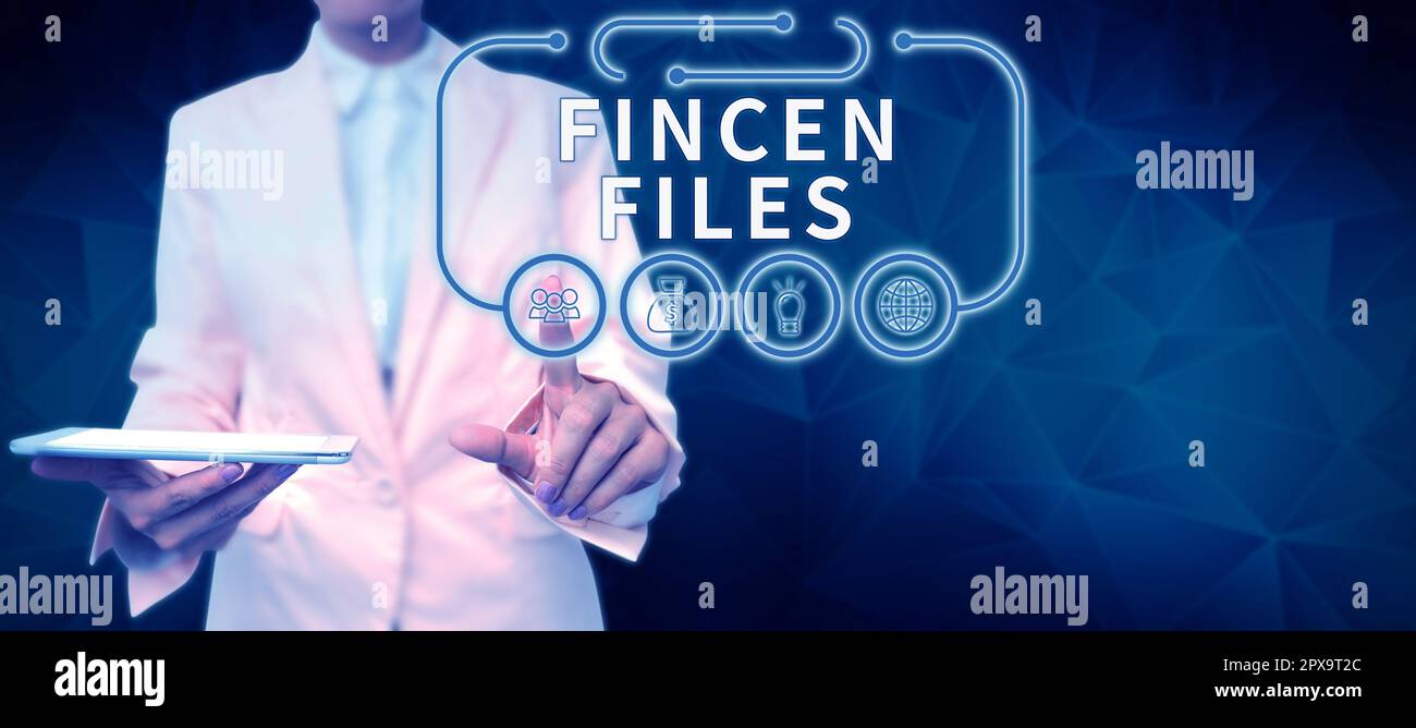 Hand writing sign Fincen Files, Word for Transactions in financial ...